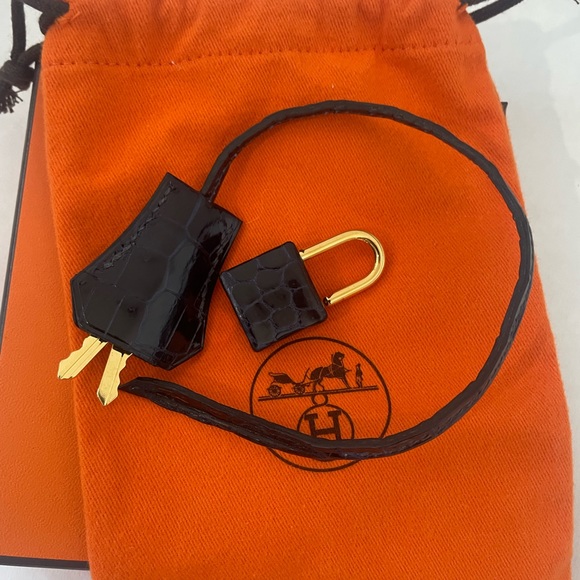 Hermes | Accessories | Hermes Crocodile Niloticus Clotchette Lock And ...